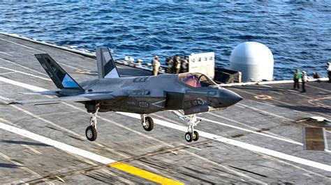 USS Abraham Lincoln Carrier Strike Group Escorted by Nuclear Submarine ...