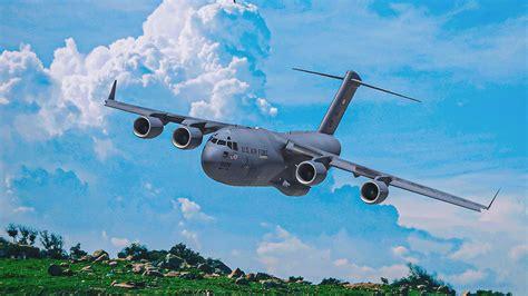 Why Military Cargo Planes Use High-Wing Designs: The Engineering Behind ...